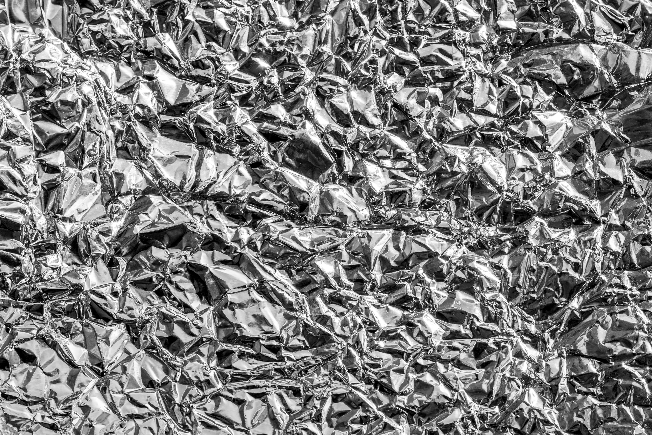 A collection of crumpled aluminium foil backgrounds.
