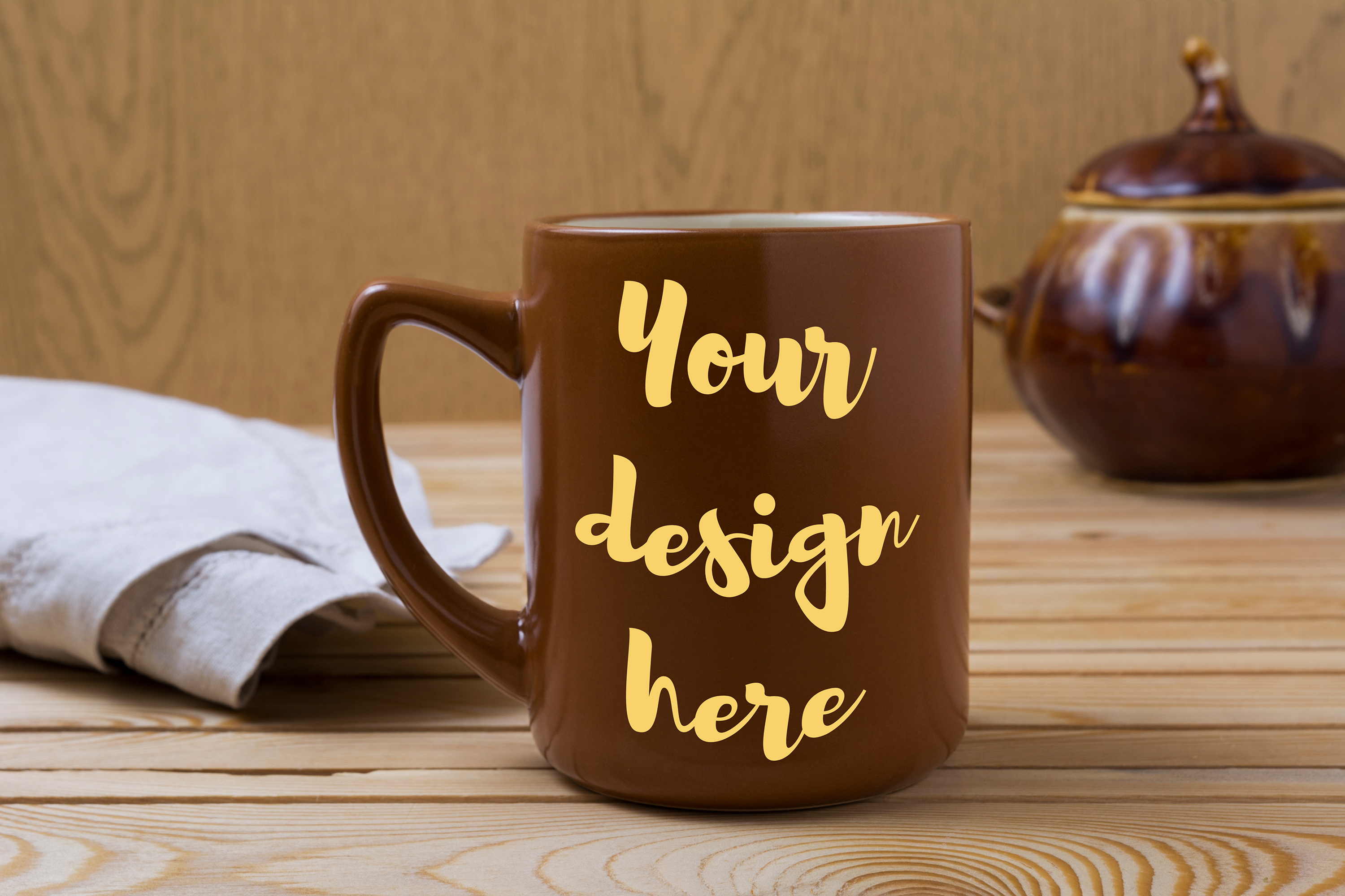 Rustic brown coffee mug mockup on the wooden background